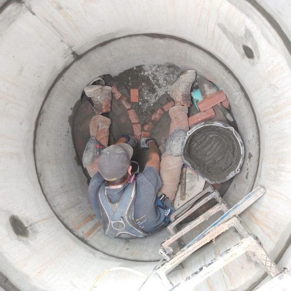 Manhole Restoration with Red Brick Inserts - Lining Pro