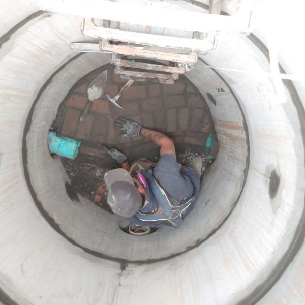 Manhole Restoration with Red Brick Inserts - Lining Pro